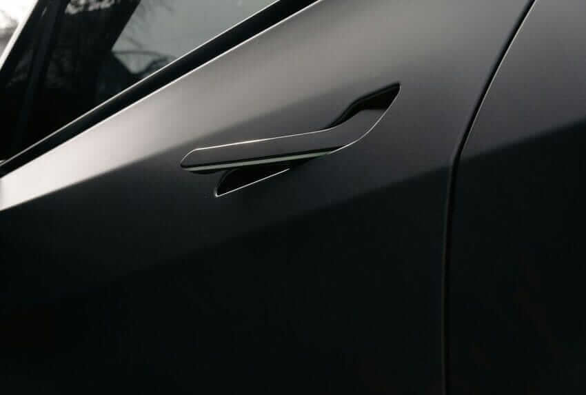 Tesla electronic door failure blamed in deadly fire | CENTRIST